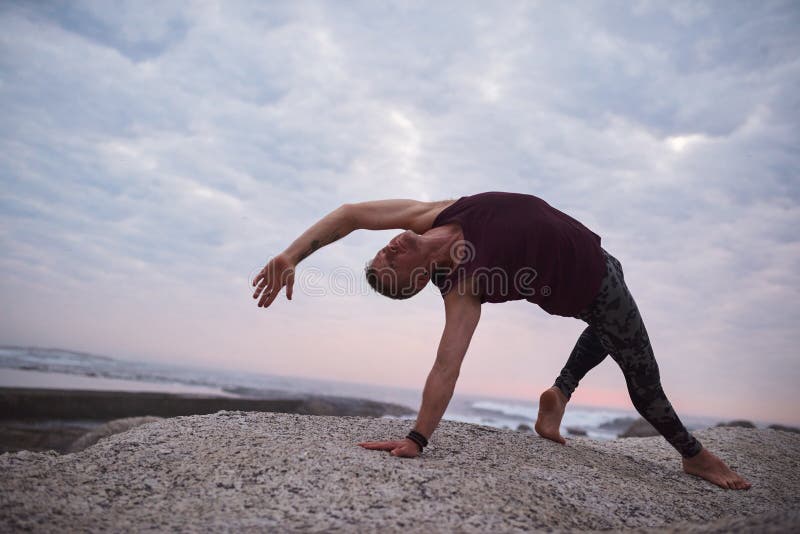 Man Doing the Wild Thing Pose by the Ocean Stock Photo - Image of ...