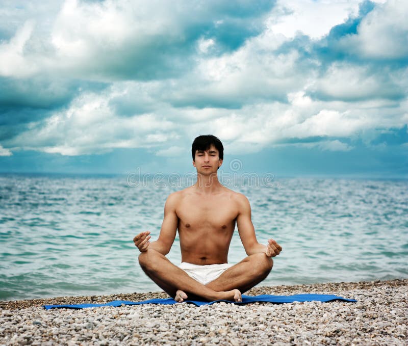 Man Doing Yoga Near the Sea Stock Image - Image of exercise, horizon ...