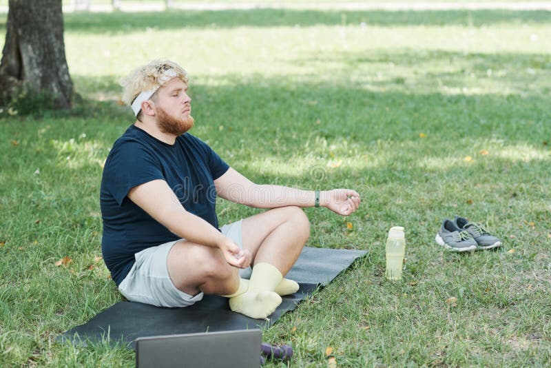 Overweight Man Doing Meditation Stock Photos - Free & Royalty-Free ...