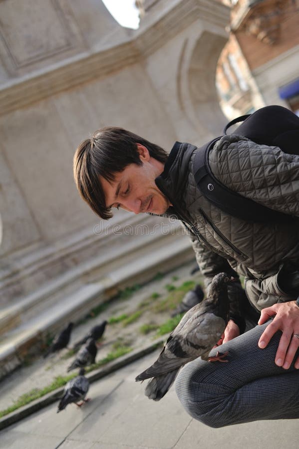 Man and doves stock photo. Image of ukraine, park, hand - 38716756