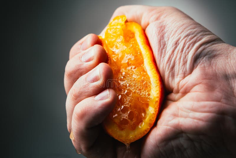 Man Dramatic Squeezes Orange. Conceptis Tired from Work. Stock Photo ...