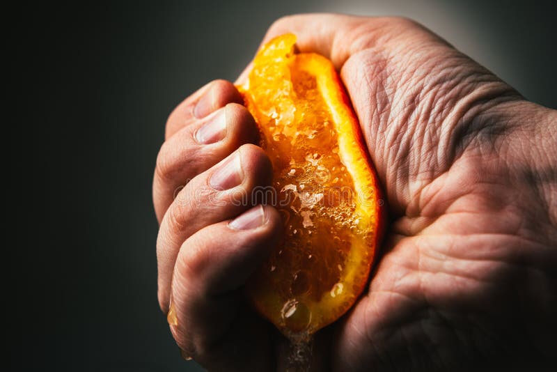 Man Dramatic Squeezes Orange. Conceptis Tired from Work. Stock Photo ...