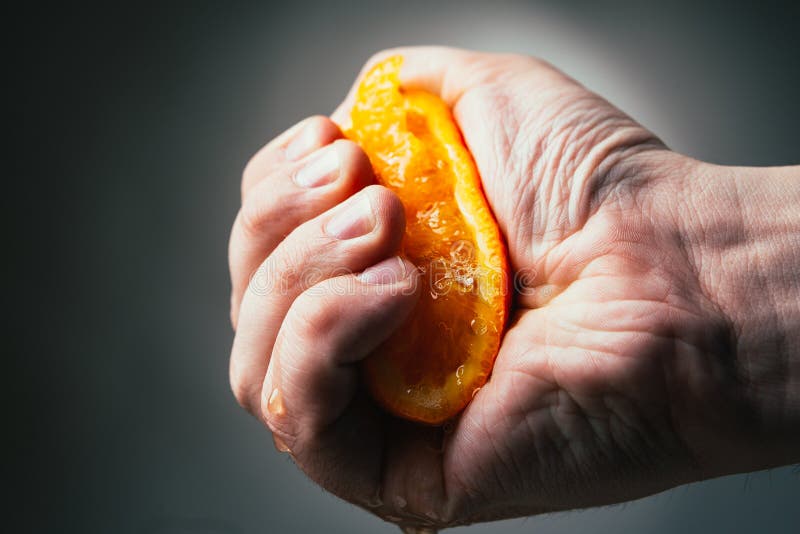 Man Dramatic Squeezes Orange. Conceptis Tired from Work. Stock Photo ...