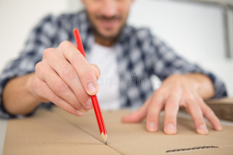 Man Drawing Box with Pencil Stock Photo - Image of people, order: 319216472