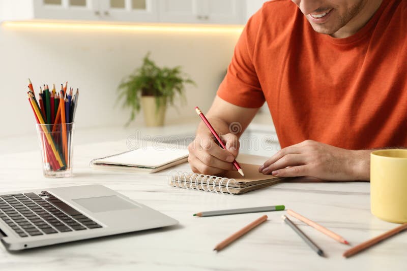 Man Drawing in Notebook at Online Lesson Indoors, Closeup. Distance ...
