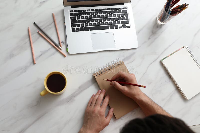 Man Drawing in Notebook at Table, Top View. Distance Learning Stock ...