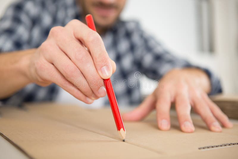 Man drawing over box stock image. Image of mounting - 267207927