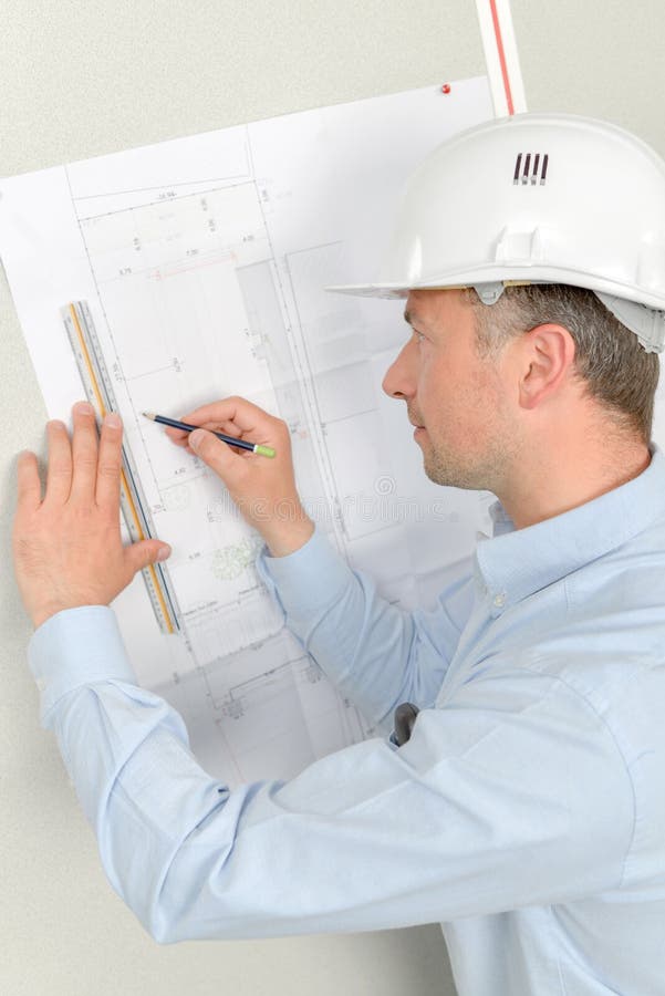 Man drawing a plan stock image. Image of hard, enhancement - 124183743