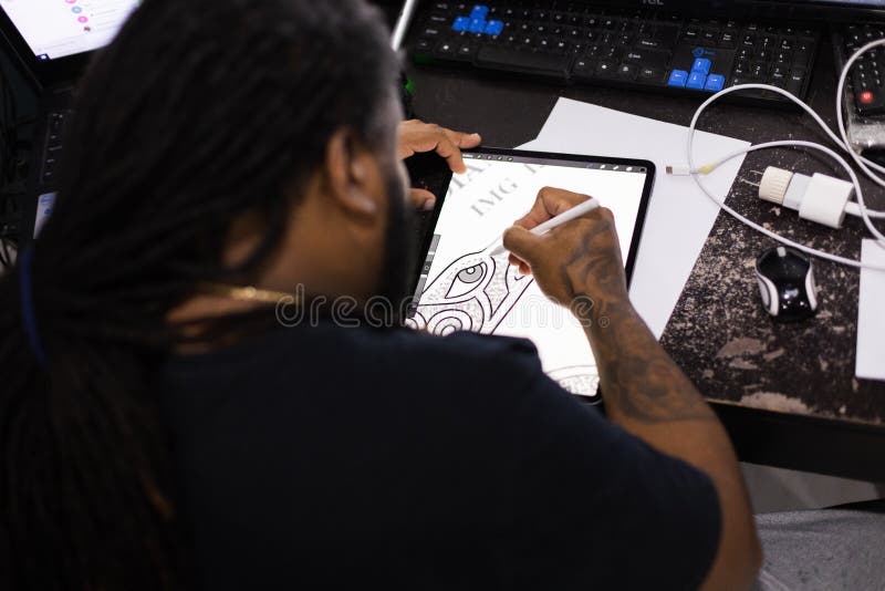 Man Drawing on a Tablet. Rear View Stock Image - Image of lines, tablet ...