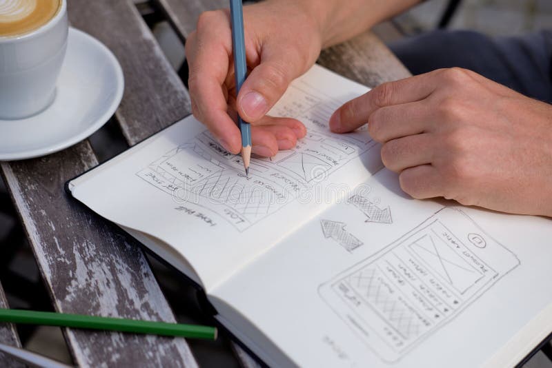 Man Draws a Sketch Graphic Design Stock Photo - Image of media, design ...