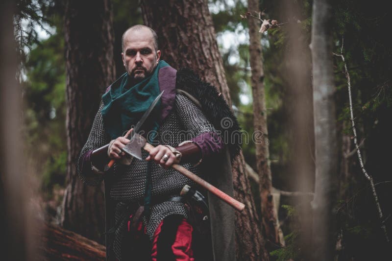 Man Dressed in Authentic Medieval Armor Standing in the Middle of ...