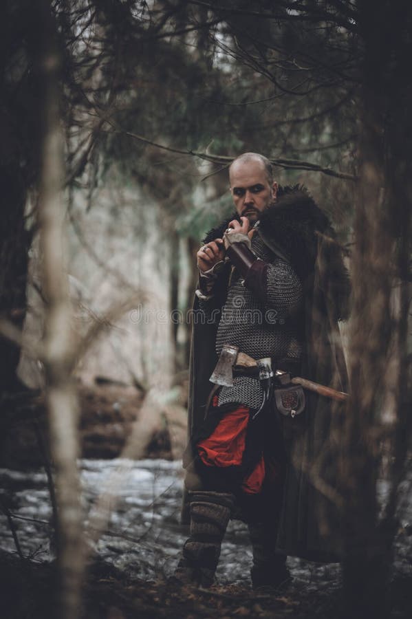 Man Dressed in Authentic Medieval Armor Standing in the Middle of ...
