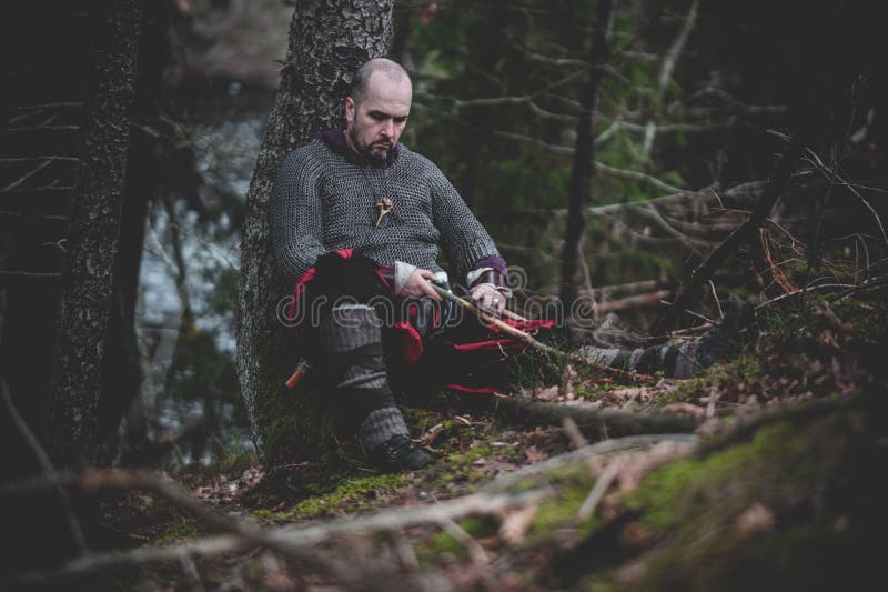 Man Dressed in Authentic Medieval Armor Standing in the Middle of ...