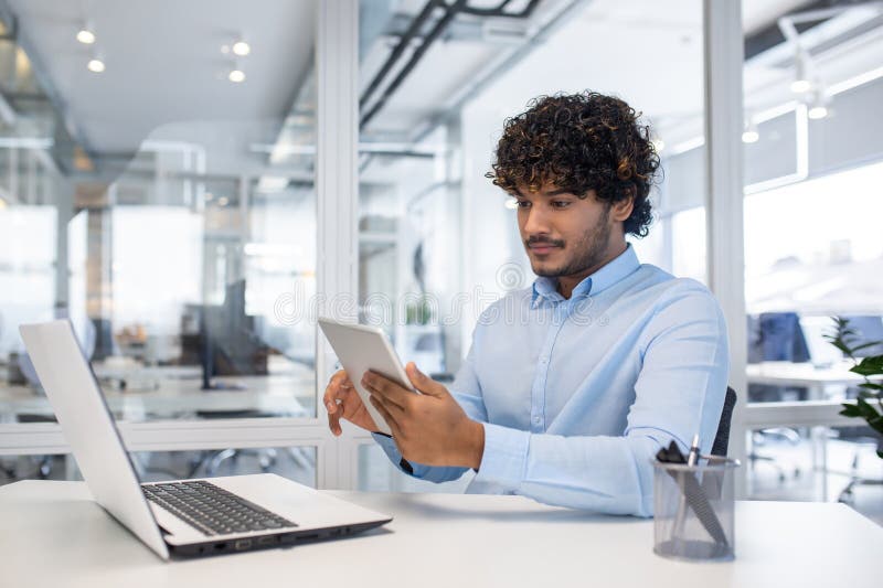 Professional Man Using Tablet at Modern Office Desk Stock Photo - Image ...