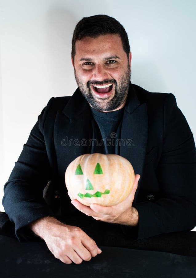 Man Dressed Up for Halloween with a Pumpkin in His Hand Stock Image ...