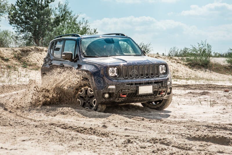 Sand drifting across beach stock image. Image of brown - 19260143