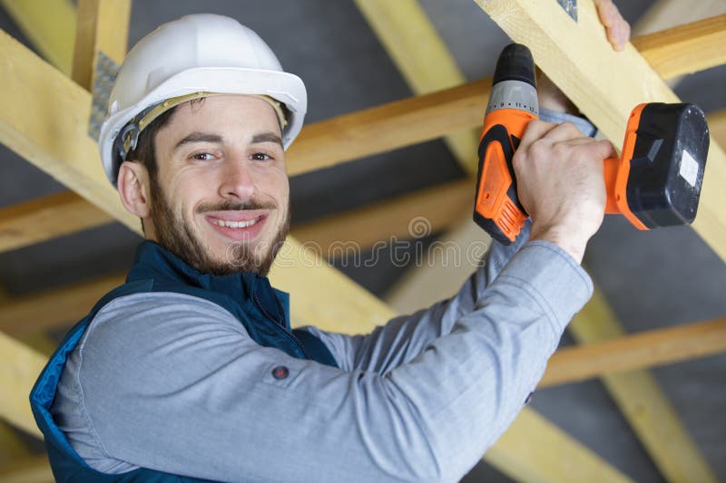 Man Drilling New House Construction Frame Stock Image - Image of ...