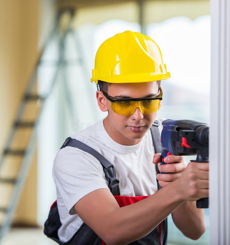 Man Drilling the Wall with Drill Perforator Stock Image - Image of ...