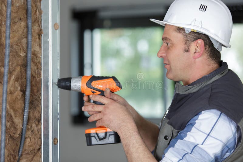 Man Drilling Wall with Drill Perforator Stock Image - Image of ...