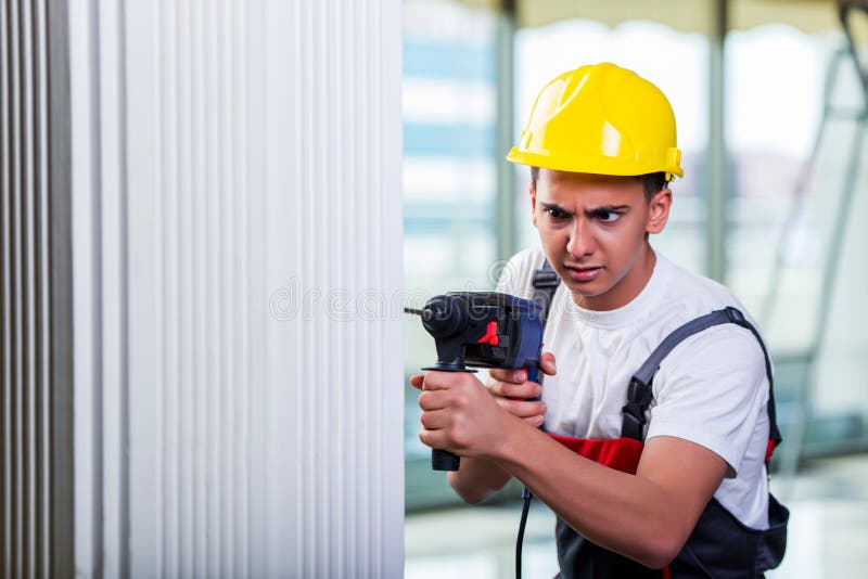 The Man Drilling the Wall with Drill Perforator Stock Photo - Image of ...