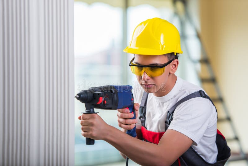 The Man Drilling the Wall with Drill Perforator Stock Photo - Image of ...