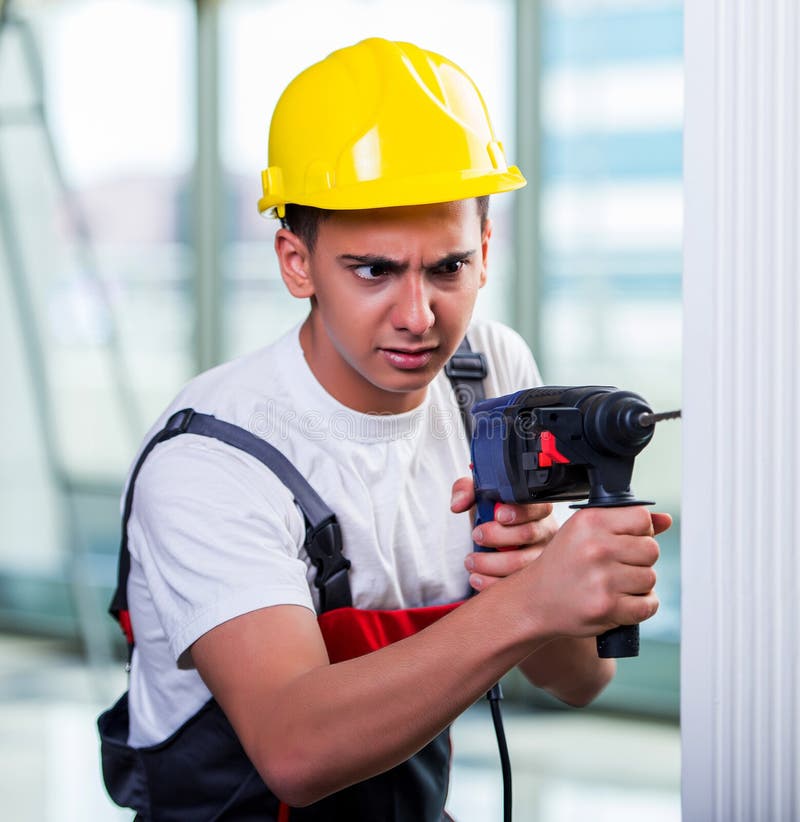 Man Drilling the Wall with Drill Perforator Stock Image - Image of ...