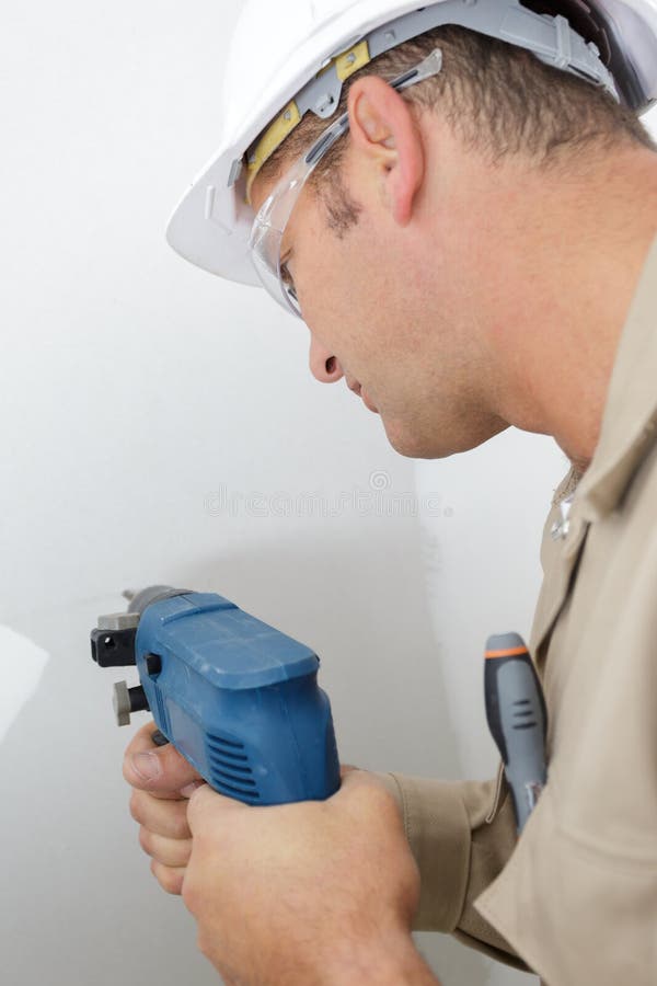 Man Drilling Wall with Drill Perforator Stock Image - Image of electric ...