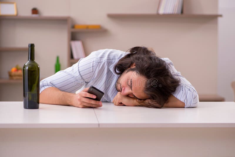 Young Man Drinking Alcohol at Home Stock Image - Image of alcohol ...