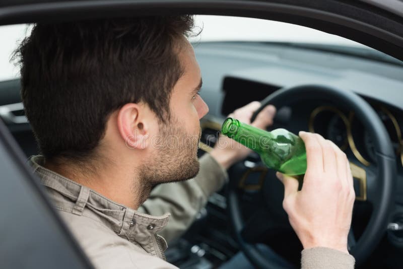 Man Drinking Beer while Driving Stock Image - Image of road, male: 49212305