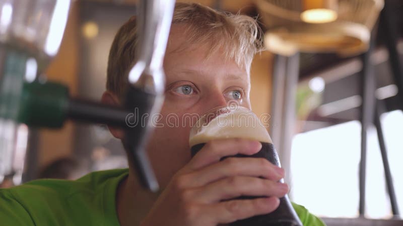 Sad Man Drinks Beer and Enjoying Beverage at Street Bar Stock Photo ...