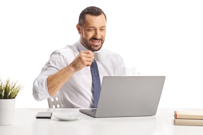 Man Drinking Coffee and Looking at a Laptop Computer Stock Image ...