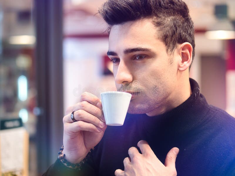 Man Drinking Coffee from Outside of the Bar Window Stock Photo - Image ...