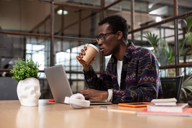 Man Drinking Coffee while Working with the Computer Stock Photo - Image ...