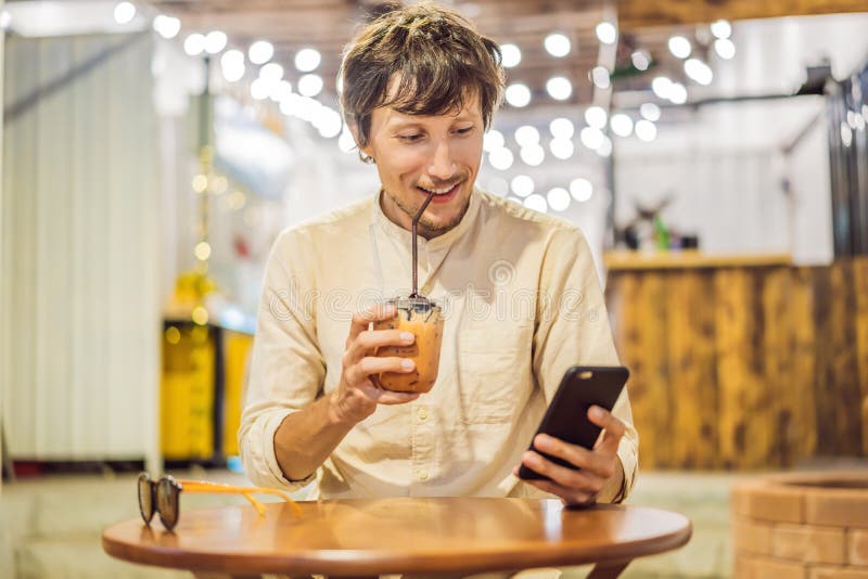 Man Drinking Cold Bubble Tea in Cafe Stock Photo - Image of beverage ...