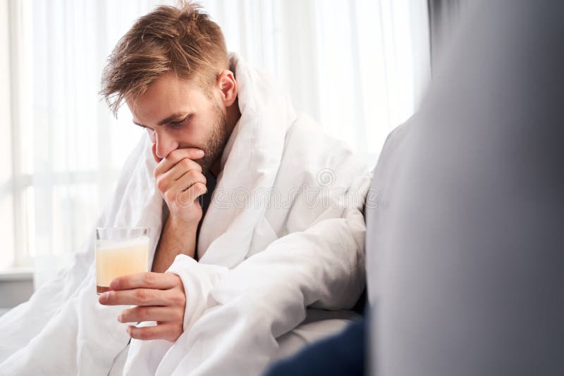 Man Drinking an Effervescent Tablet for a Cold Stock Image - Image of ...