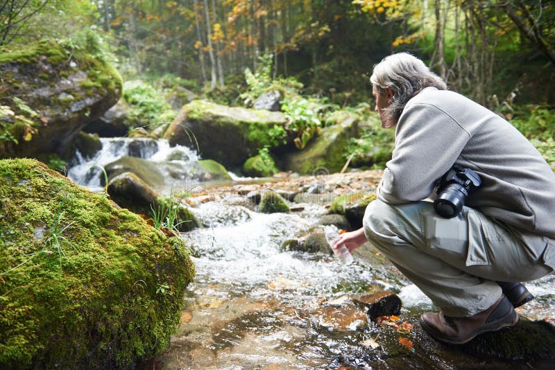 Man Drinking Fresh Water from Spring Stock Photo - Image of environment ...