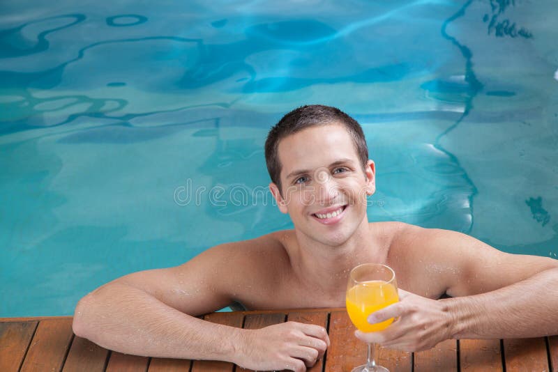 Man Drinking Juice Inside the Pool Stock Image - Image of relaxing ...