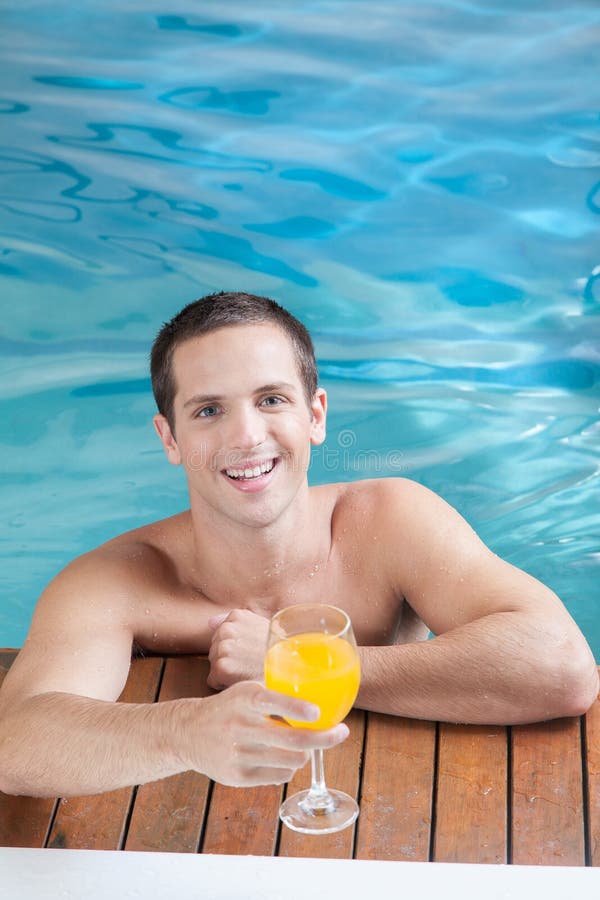 Man Drinking Juice Inside the Pool Stock Photo - Image of pool ...