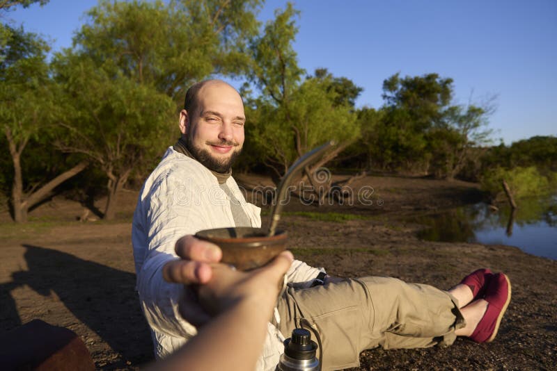 Man Drinking Mate with Someone. this Argentinian Infusion is a Symbol ...