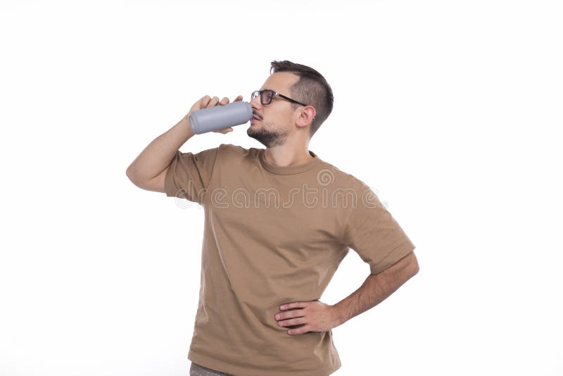 Man Drinking from Tin Can. Man with Beer Bottle in Hands. Alcohol Drink ...