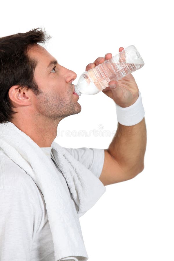 Man drinking water stock photo. Image of studio, sweatband - 31380338