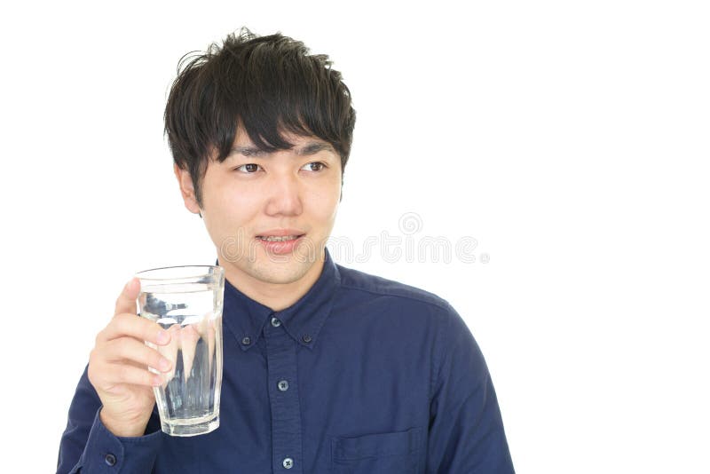 Man drinking water stock image. Image of liveliness - 127073853