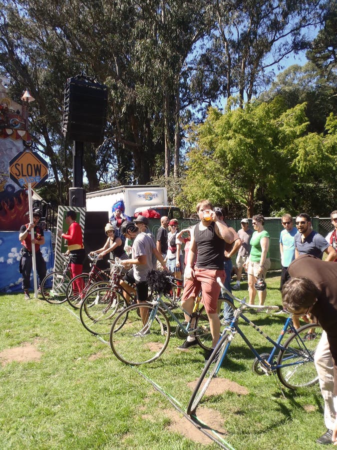 Man Drinks a Beer on His Bike Editorial Stock Photo - Image of bicycle ...