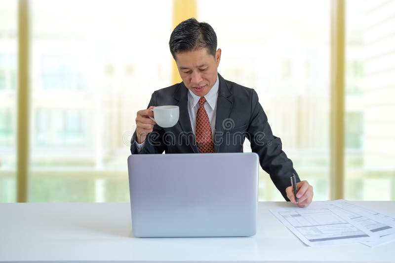 Man drinks coffee stock image. Image of handsome, business - 136468393