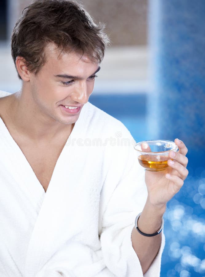 The man drinks tea stock photo. Image of water, human - 12869900
