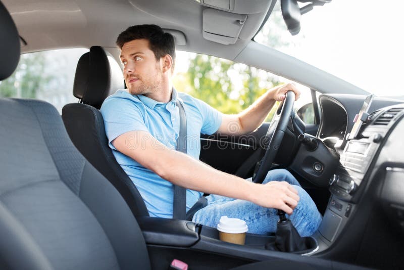 Man or Driver Driving Car and Looking Back Stock Photo - Image of ...
