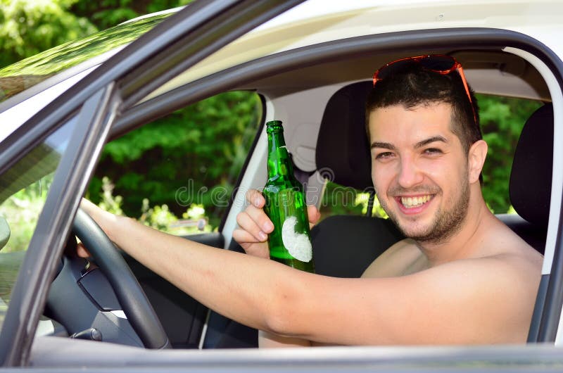 Man Driving Car with Beer in Hand Stock Image - Image of male, driving ...