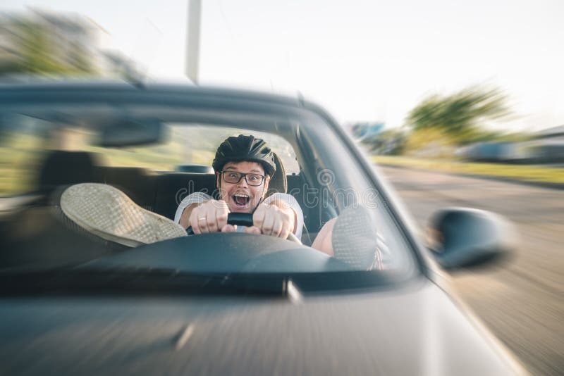 Man Driving Car in Helmet with Horror on Her Face Stock Photo - Image ...