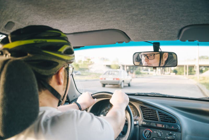 Man Driving Car in Helmet with Horror on Her Face Stock Photo - Image ...