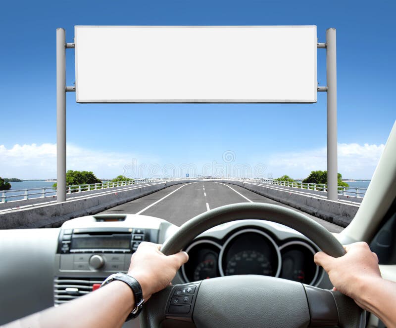 Man Driving Car on the Road and Billboard Sign Ahead Stock Photo ...